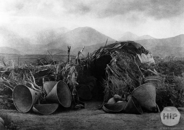 Wickiup home with baskets – History In Photographs