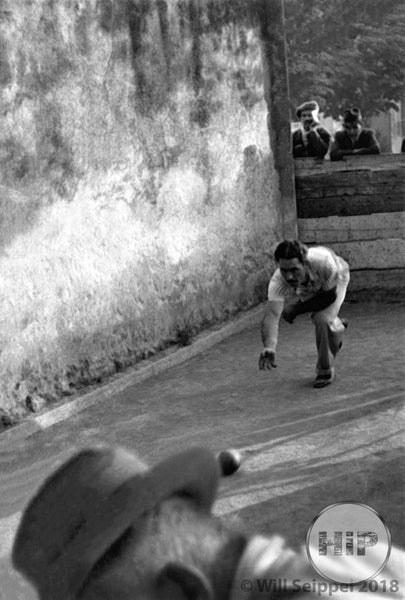WWII Photograph of Man Bowling in Outdoor City Alley with Onlookers in ...
