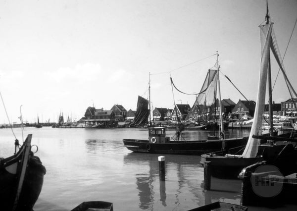 Dutch Fishing Trawlers Along a Small 1950s Harbor Town in Holland ...